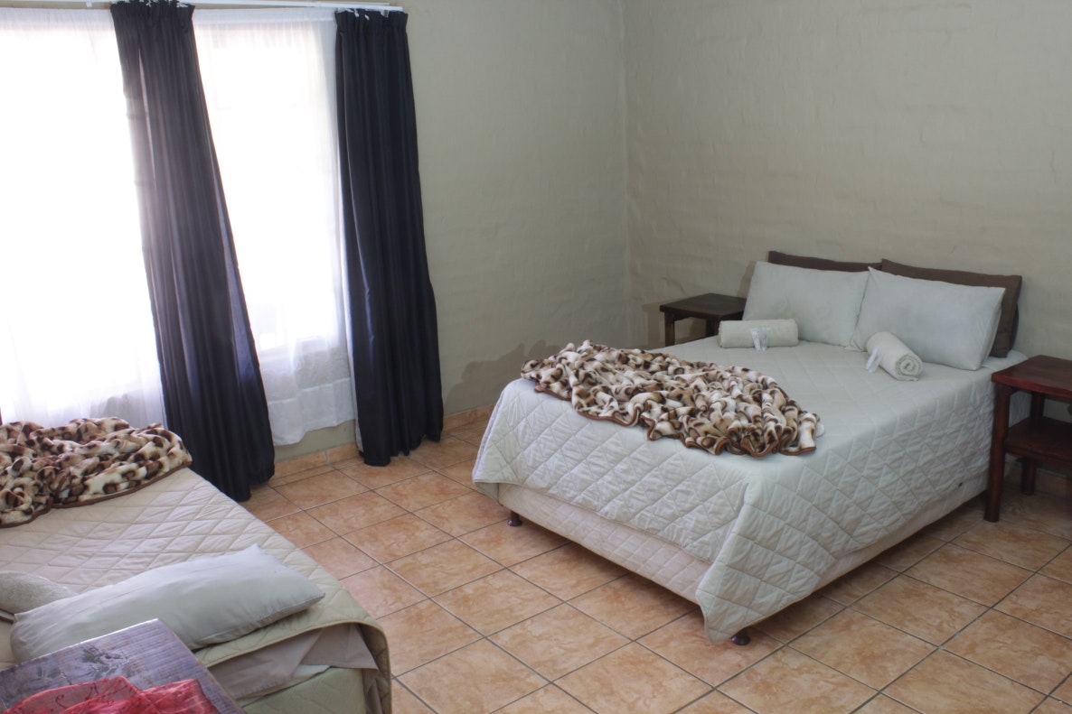 Rusties Lodge | LekkeSlaap